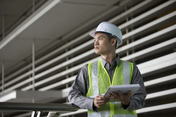 Chinese industrial engineer at work - Stock Image - Everypixel