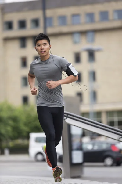 Chinese man running - Stock Image - Everypixel