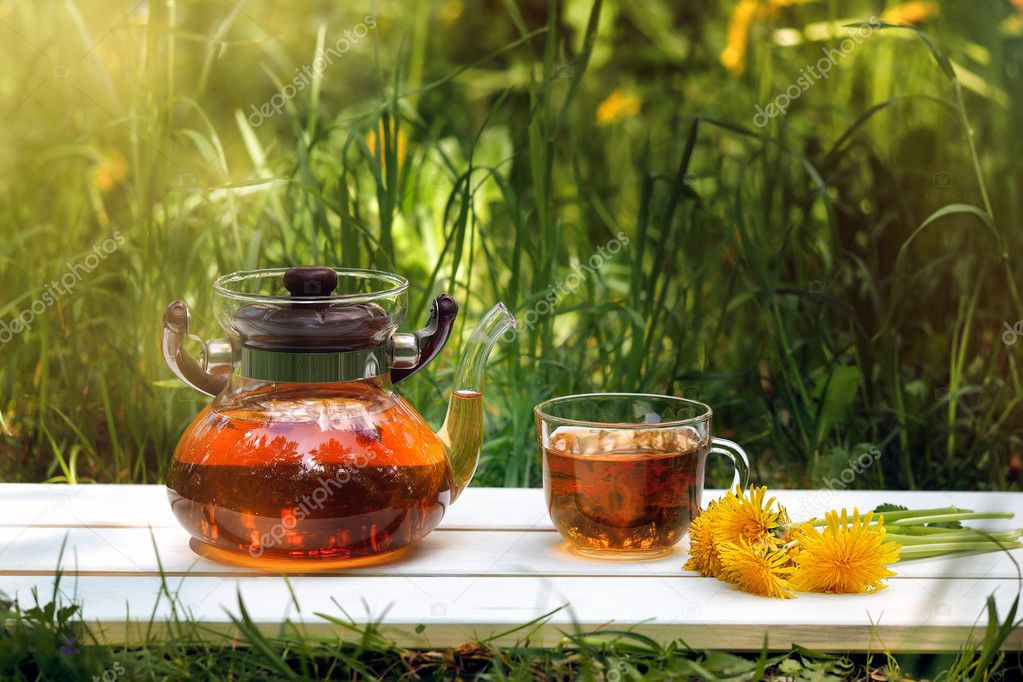 Tea with herbs in nature ⬇ Stock Photo, Image by © kozorog #111089242