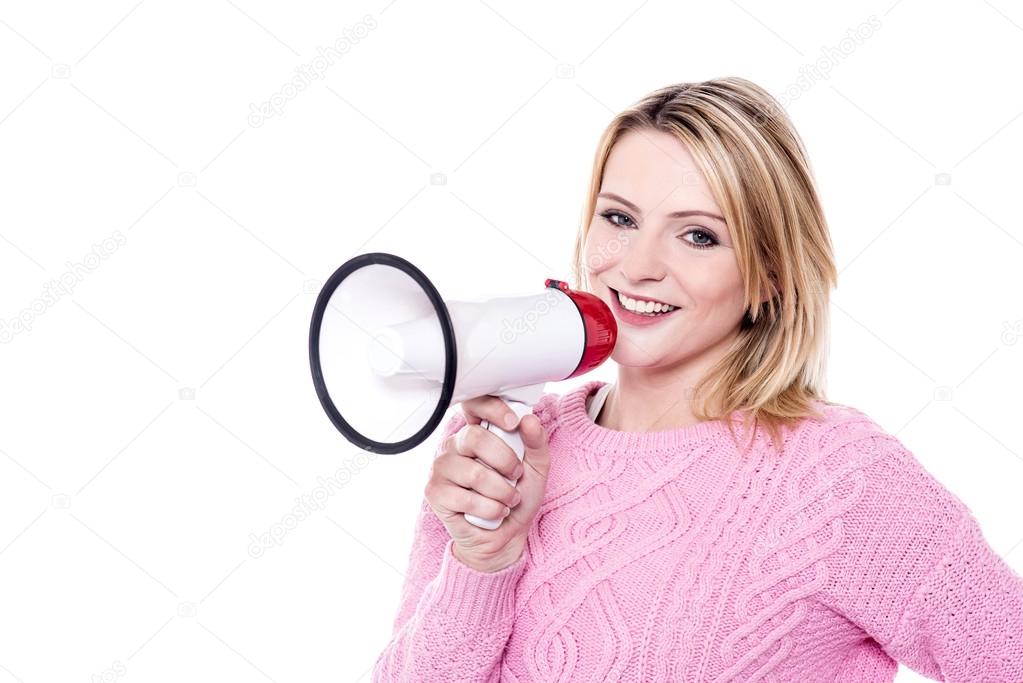 Woman making announcement with megaphone — Stock Photo © stockyimages ...