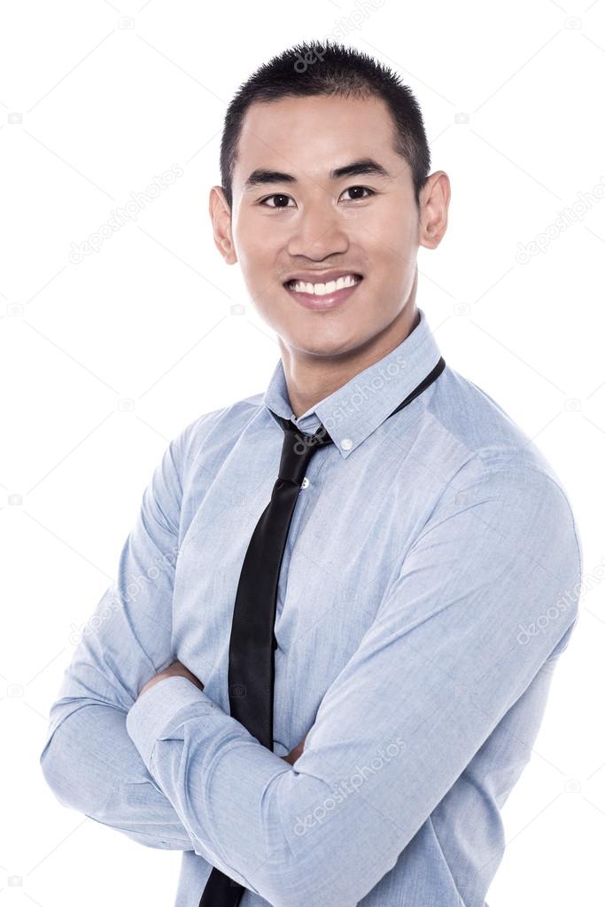 Man posing with folded arms Stock Photo by ©stockyimages 112312648 Man posing with folded arms Stock Photo by ©stockyimages 112312648