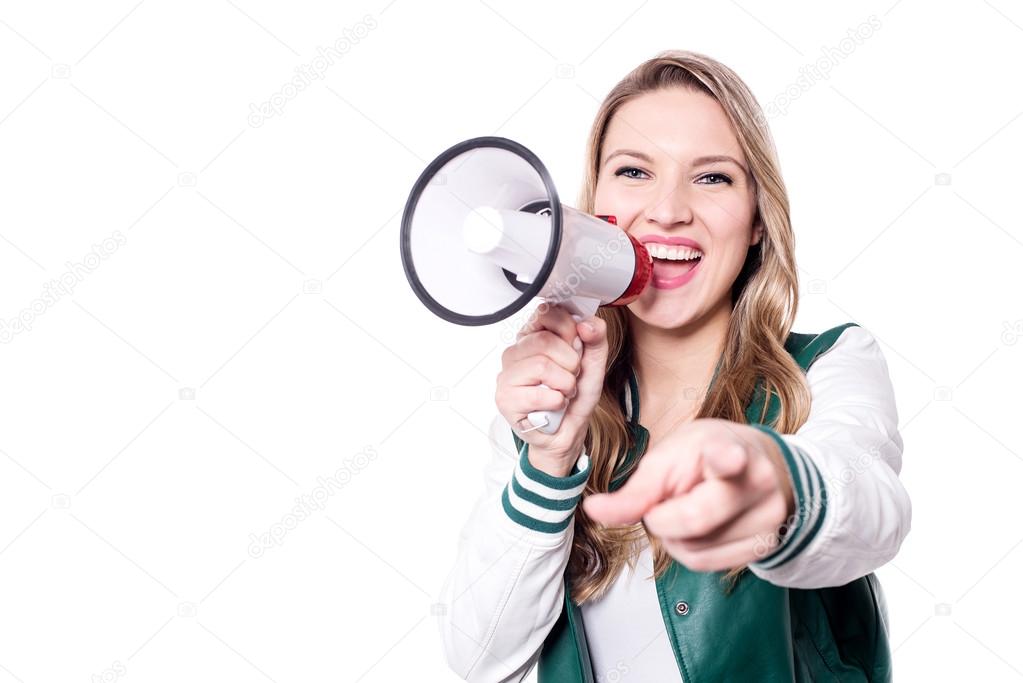 Young woman using megaphone Stock Photo by ©stockyimages 113969308