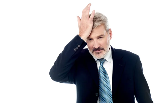 Man holding his head — Stock Photo © stockyimages #62965931