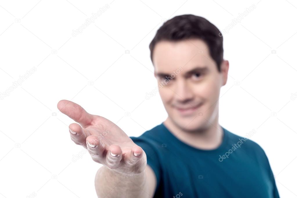 Man showing something — Stock Photo © stockyimages #65418765