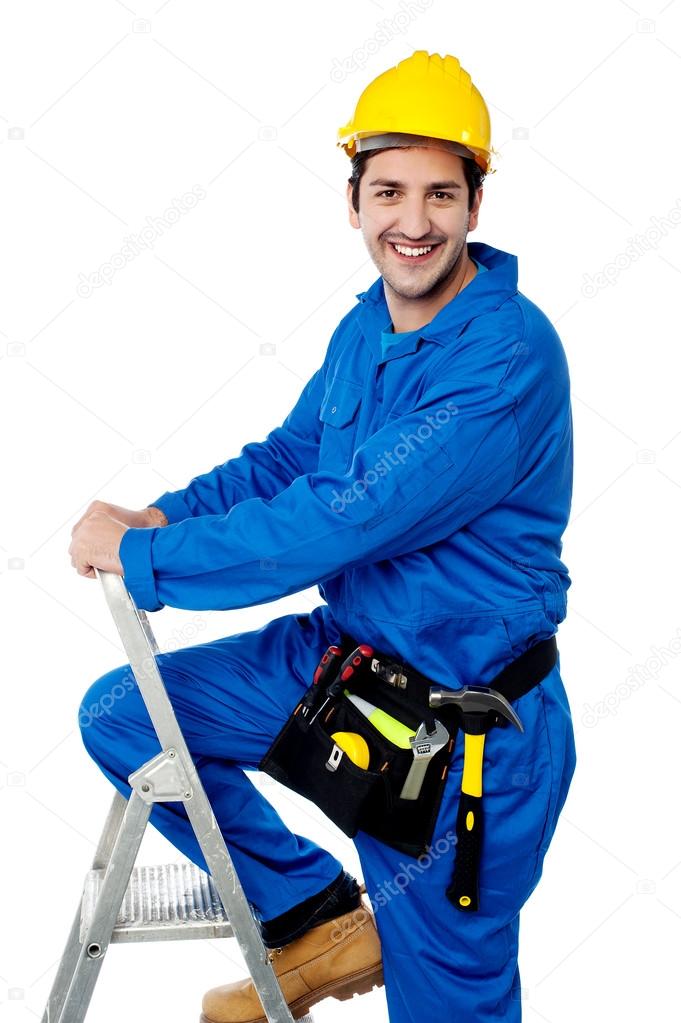 Young mechanic on the step ladder — Stock Photo © stockyimages #87924716