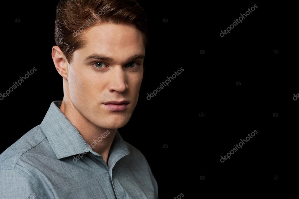 Handsome male model looking at camera Stock Photo by ©stockyimages 95571302
