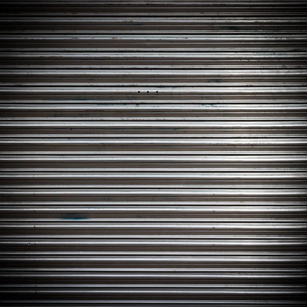 Metal roller shutter Stock Photo by ©romantsubin 53844051