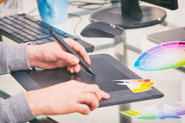 Designer using graphics tablet Stock Photo by ©Amaviael 110289402