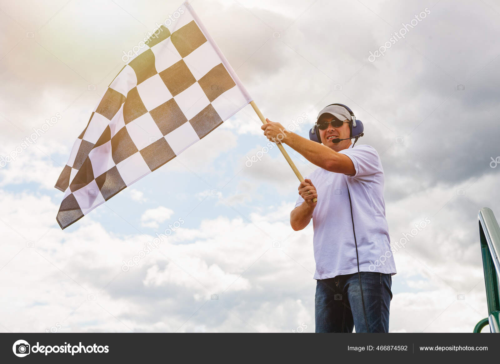 Man Waves Checkered Flag Finish Line Race Stock Photo by ©Amaviael 466874592