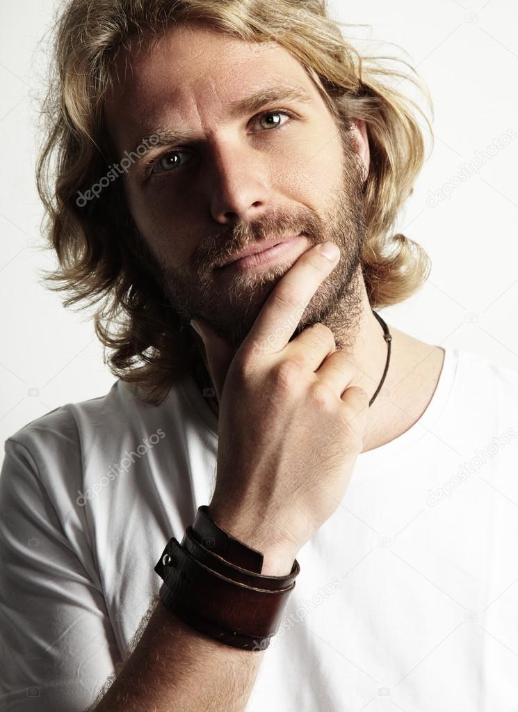 Man touching beard — Stock Photo © kazzakova #58937821