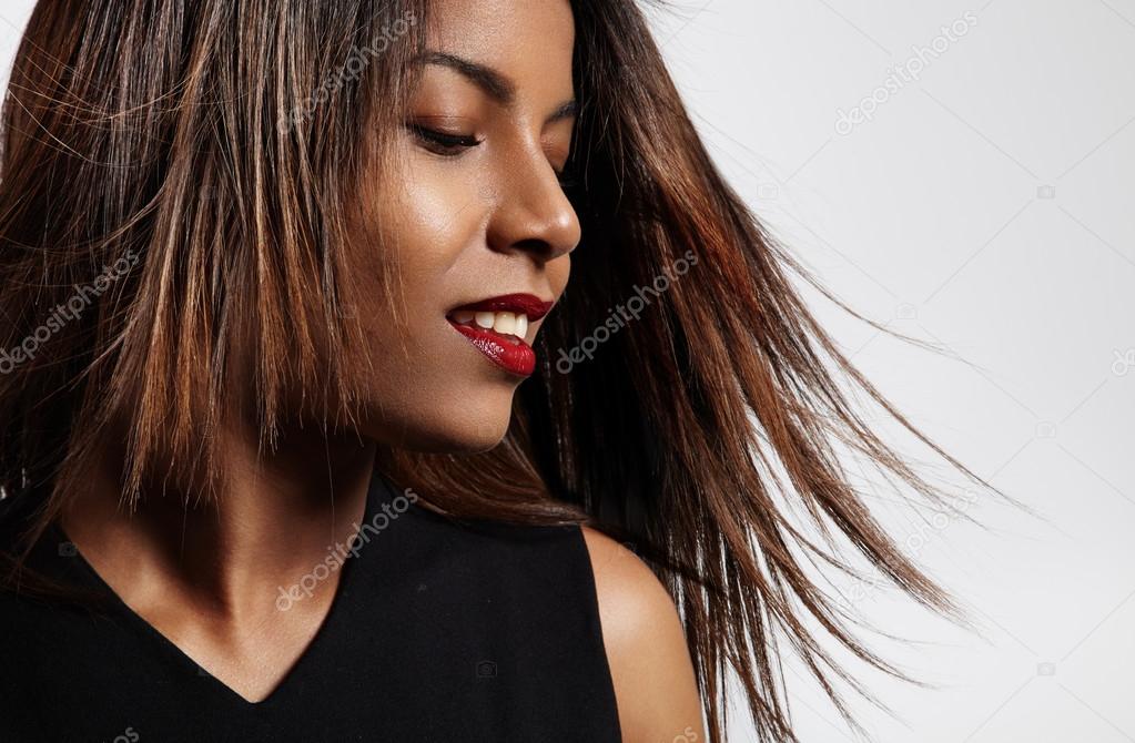 Woman with fluttering hair Stock Photo by ©kazzakova 58938433