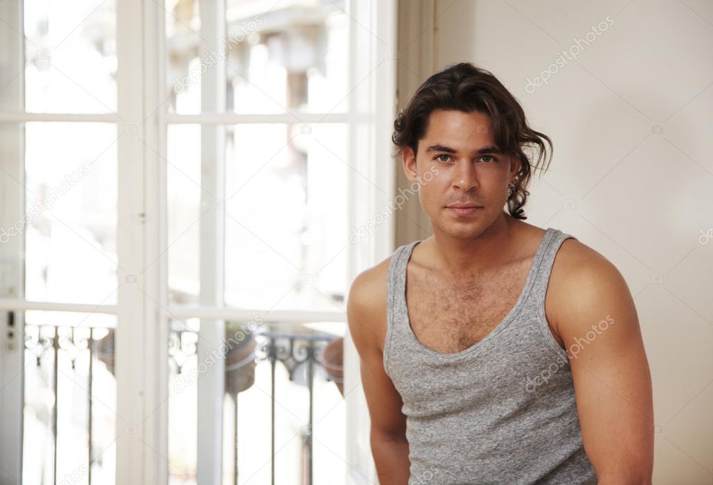 Man in room with window Stock Photo by ©kazzakova 70238963