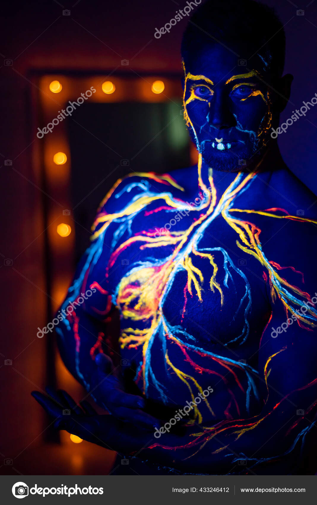 UV patterns body art of the circulatory system on a mans body. On the ...