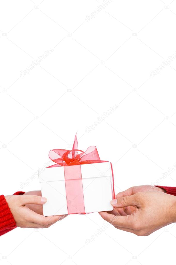 Hands holding gift Stock Photo by ©Wavebreakmedia 102614722