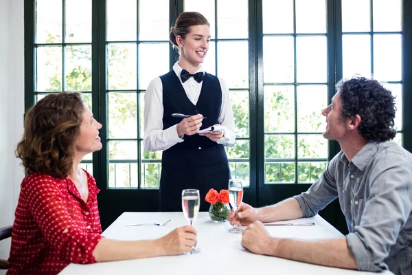 Waitress taking the order from restaurant table — Stock Photo ...