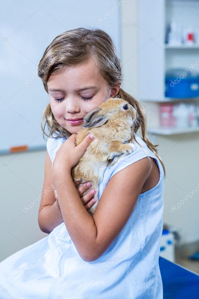 A cute little girl hugging is rabbit Stock Photo by ©Wavebreakmedia ...