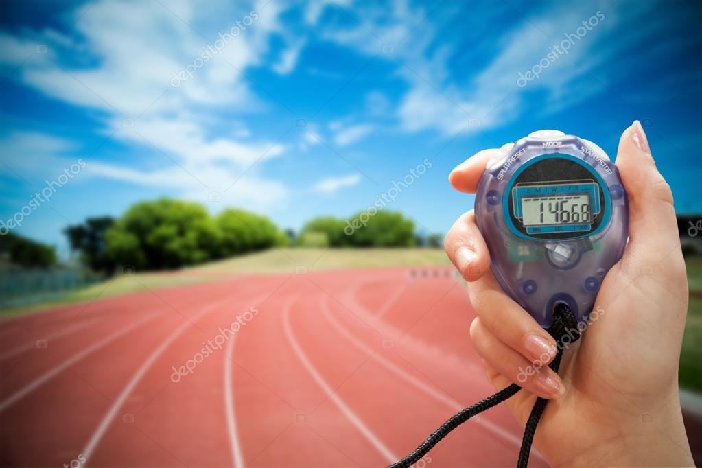 Hand holding a timer — Stock Photo © Wavebreakmedia #110705364