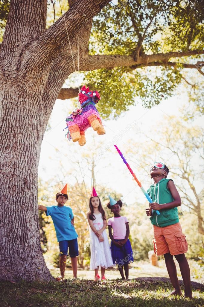 Boy is going to broke pinata Stock Photo by ©Wavebreakmedia 110801840