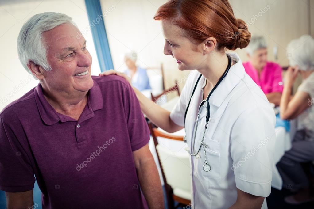Nurse assisting a senior Stock Photo by ©Wavebreakmedia 110810420