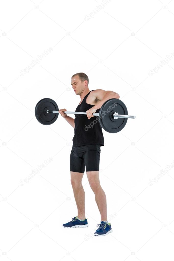 Bodybuilder lifting heavy barbell weights Stock Photo by ...