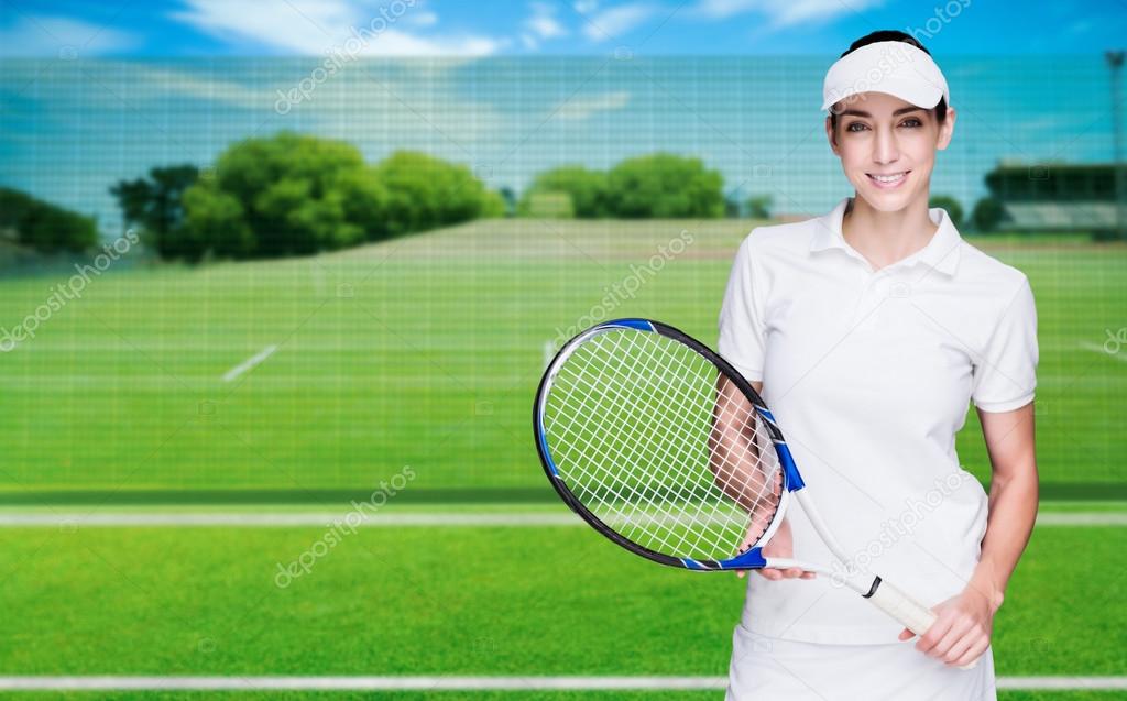 Female athlete posing with tennis racket Stock Photo by ©Wavebreakmedia ...