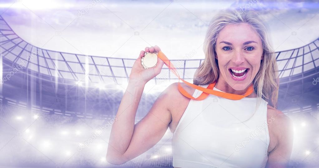 Athlete posing with gold medal — Stock Photo © Wavebreakmedia #111728460