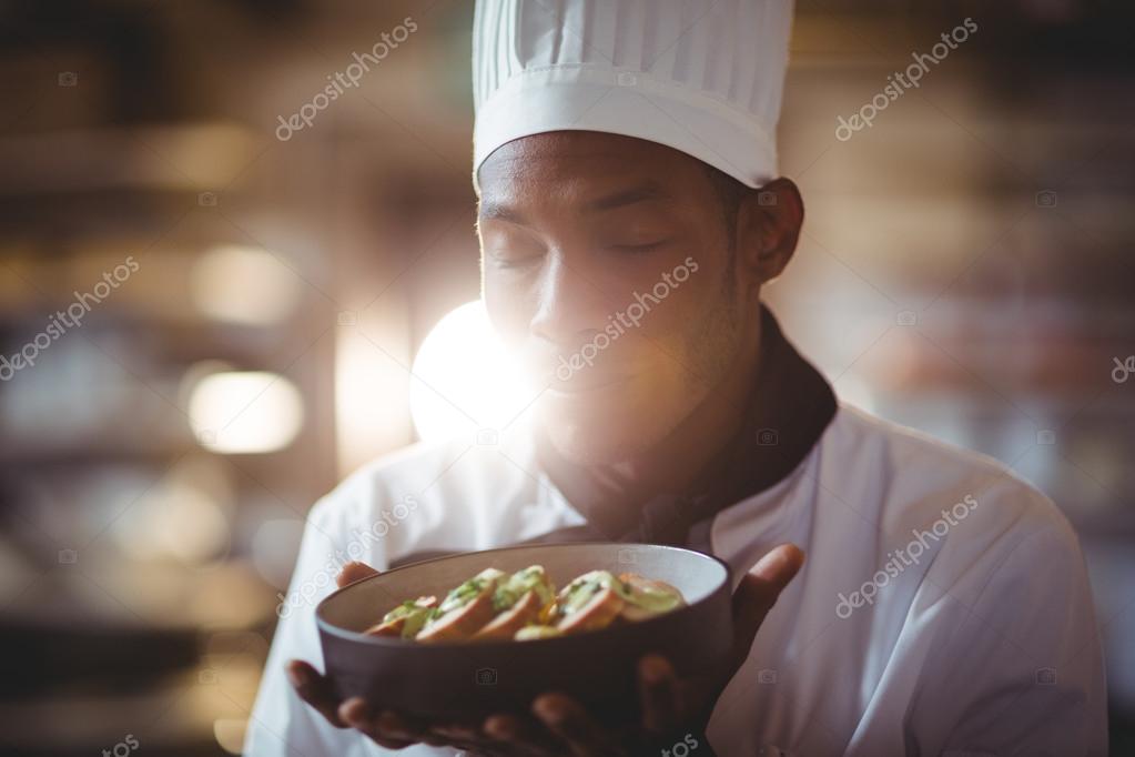 Chef smelling food — Stock Photo © Wavebreakmedia #112930284