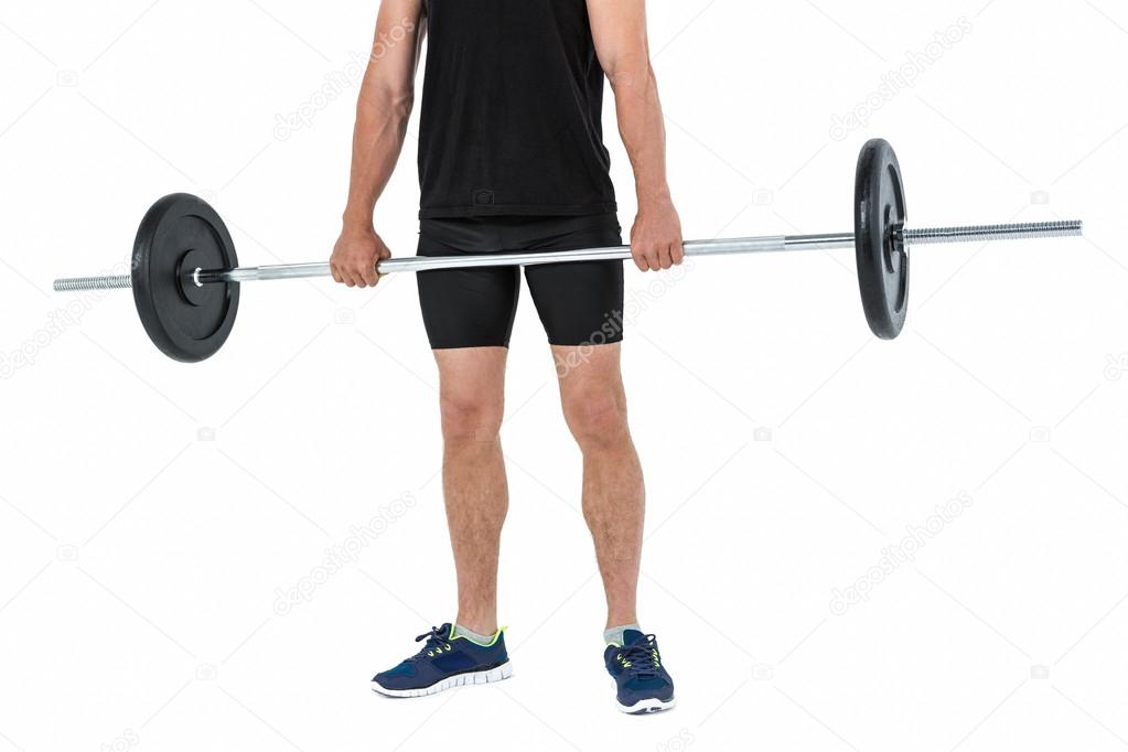 Bodybuilder lifting heavy barbell weights Stock Photo by ...