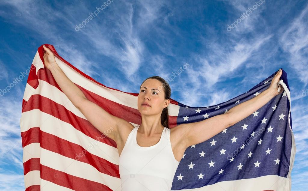 Athlete posing with american flag — Stock Photo © Wavebreakmedia #113552192