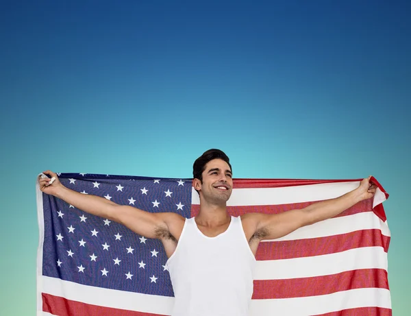 Athlete posing with american flag - Stock Image - Everypixel