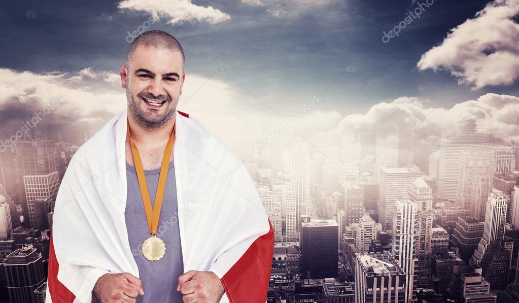 Athlete with olympic gold medal Stock Photo by ©Wavebreakmedia 113571744