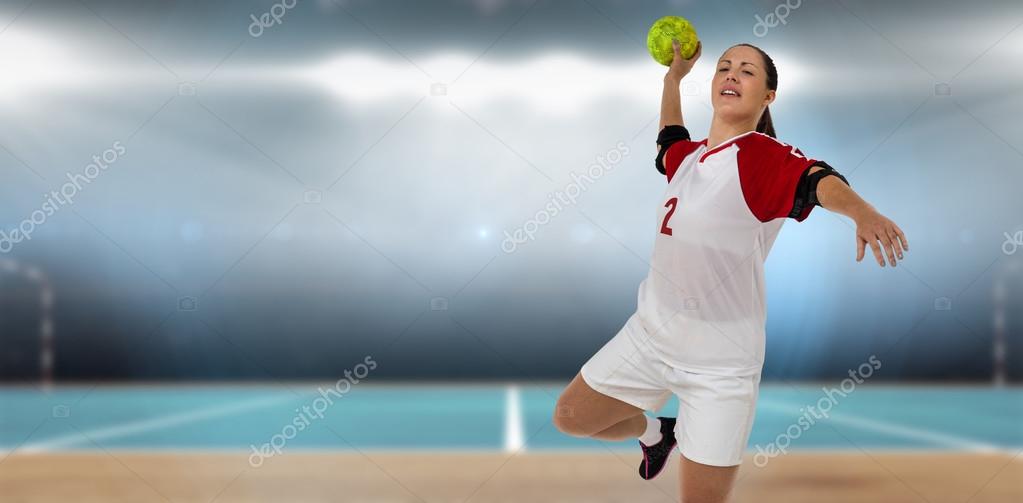 Sportswoman throwing ball Stock Photo by ©Wavebreakmedia 113577734