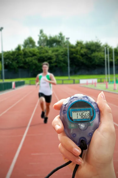 Hand holding a timer — Stock Photo © Wavebreakmedia #110705364