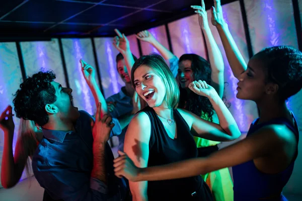 Friends dancing on dance floor Stock Photo by ©Wavebreakmedia 115149224