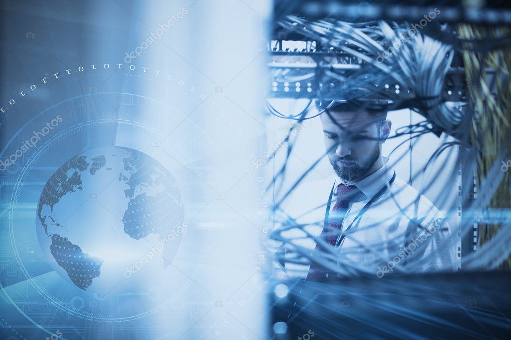 Man in data center Stock Photo by ©Wavebreakmedia 115157860