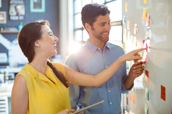 Business executive and co-worker interacting - Stock Image - Everypixel