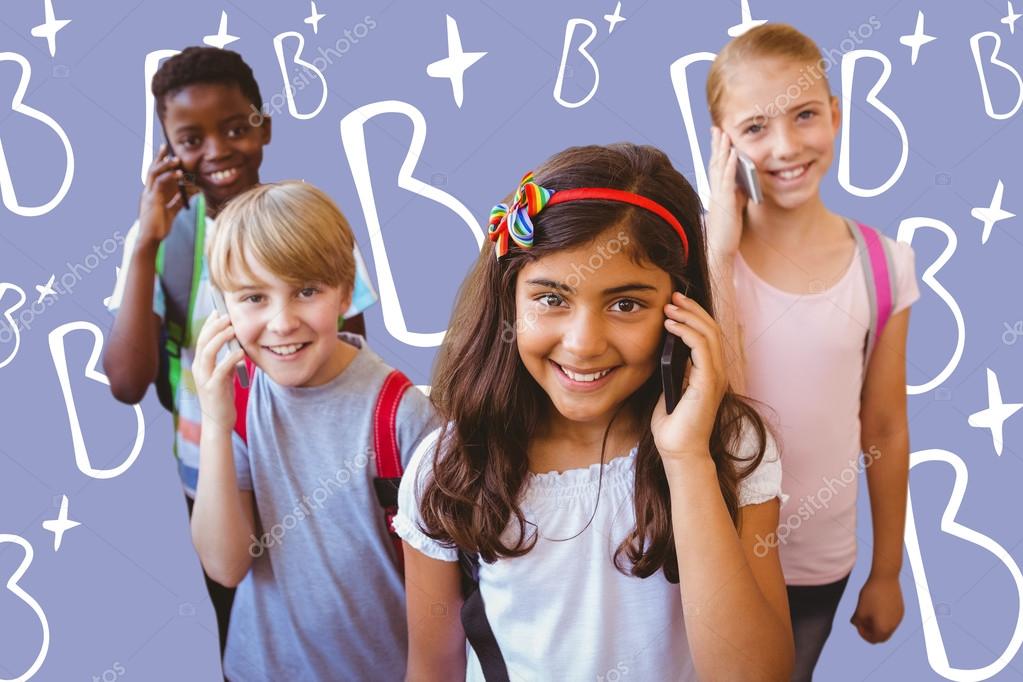 School kids using cellphones Stock Photo by ©Wavebreakmedia 120430596