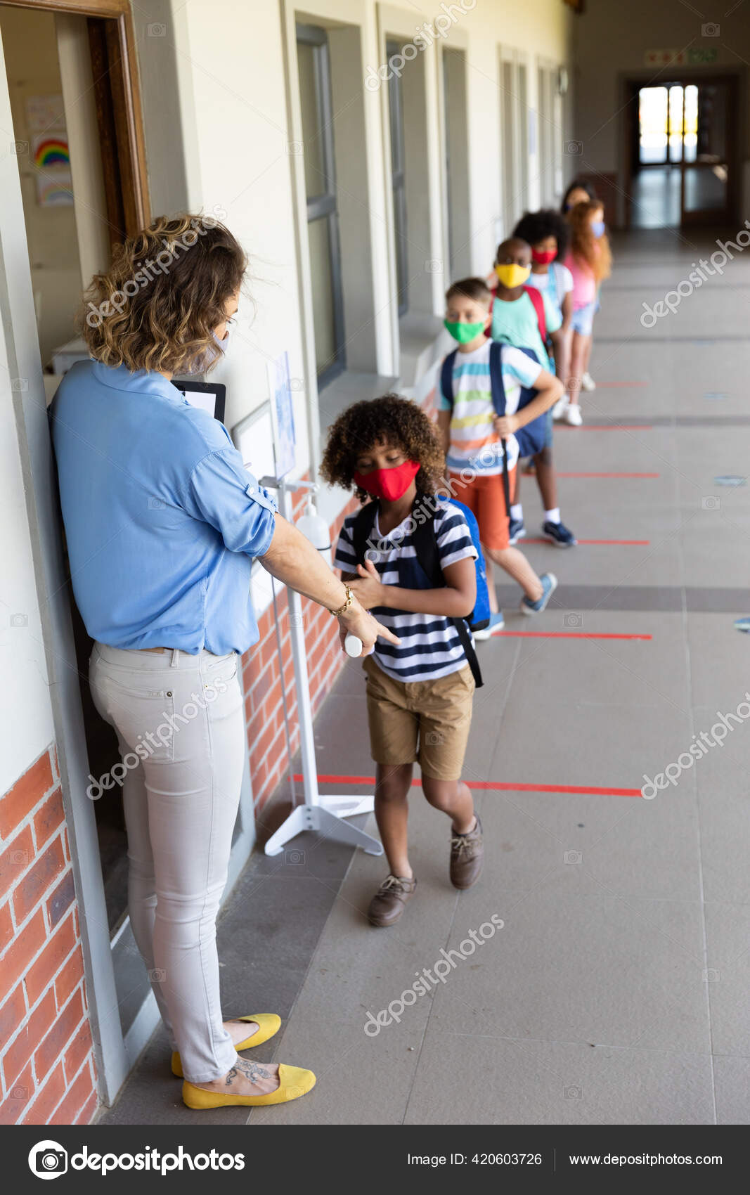 Children Standing In Line At School