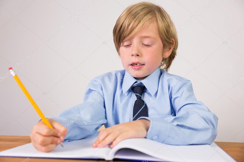 Student writing notes in notepad Stock Photo by ©Wavebreakmedia 53915943
