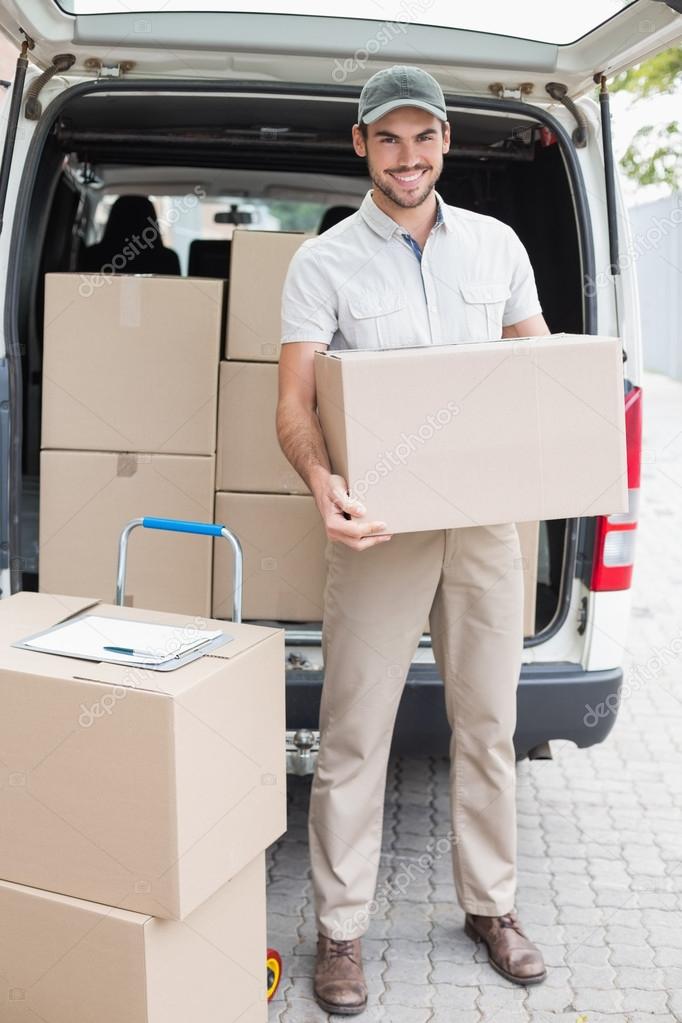 Delivery driver loading his van with boxes — Stock Photo ... Delivery driver loading his van with boxes — Stock Photo ...