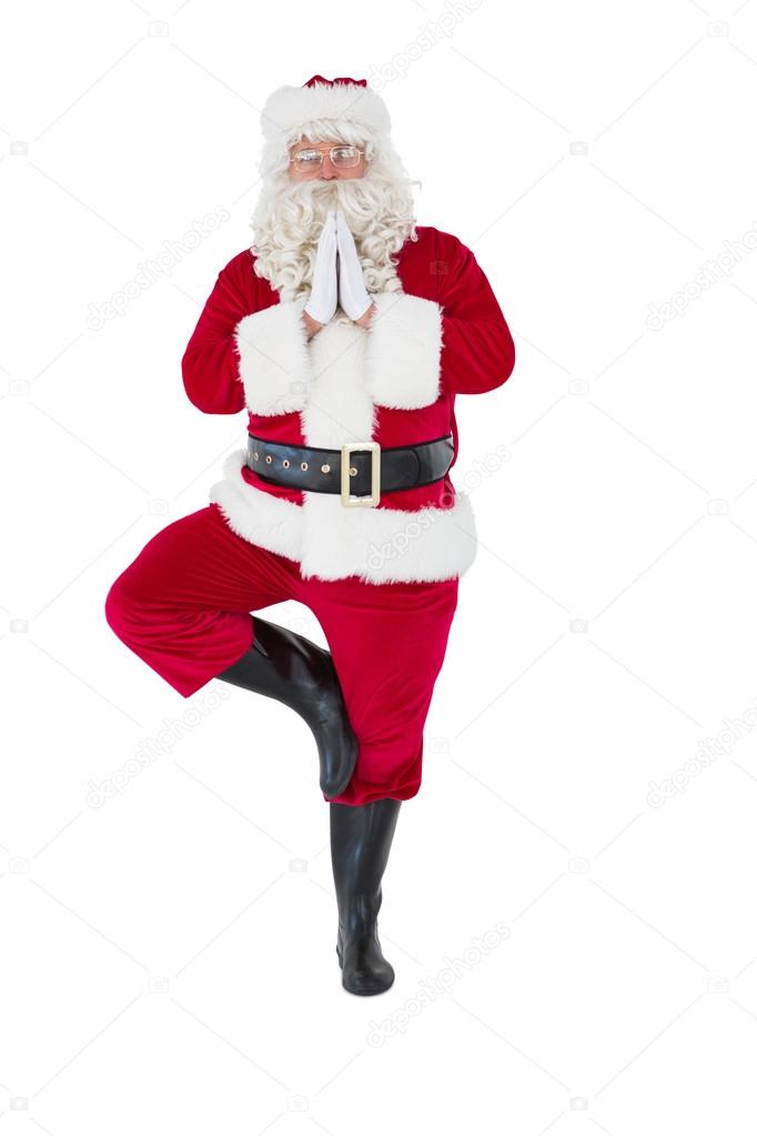 Santa claus in tree pose Stock Photo by ©Wavebreakmedia 57254197