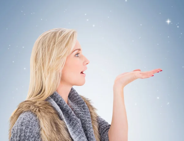 Blonde with hand out - Stock Image - Everypixel