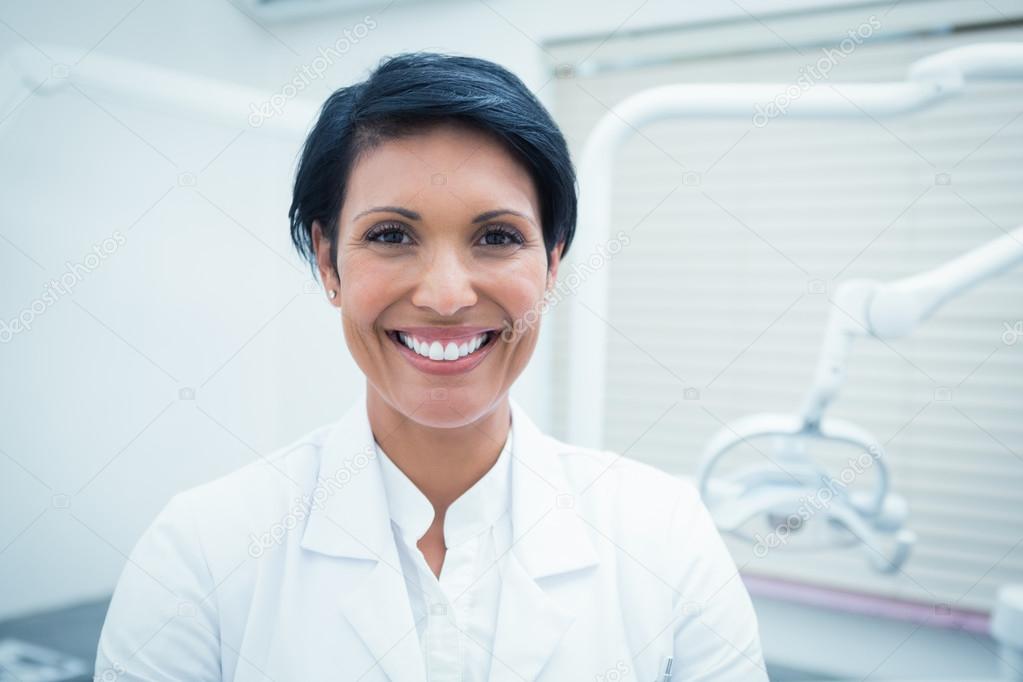 Smiling female dentist — Stock Photo © Wavebreakmedia #65287547