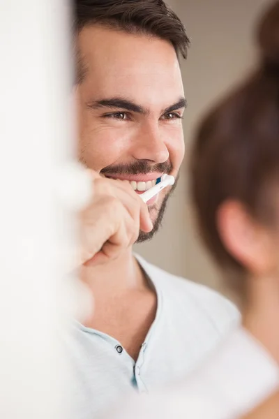 Man brushing his teeth Stock Photo by ©gstockstudio 62790293