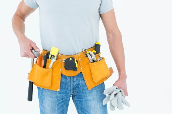 Handyman wearing tool belt — Stock Photo © Wavebreakmedia #68996565