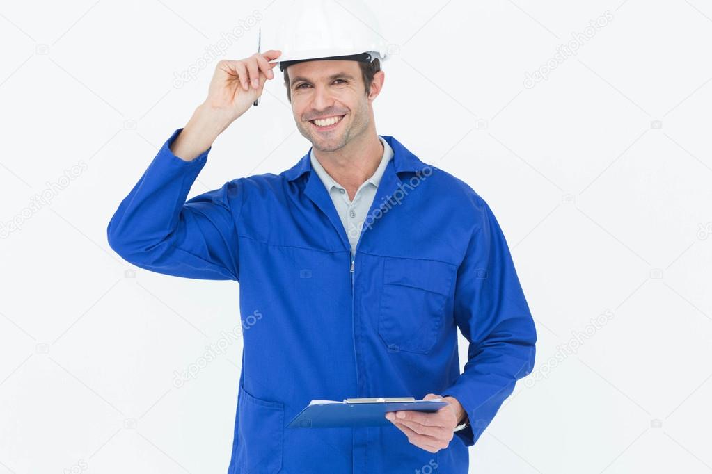 Happy supervisor wearing hard hat Stock Photo by ©Wavebreakmedia 65558289