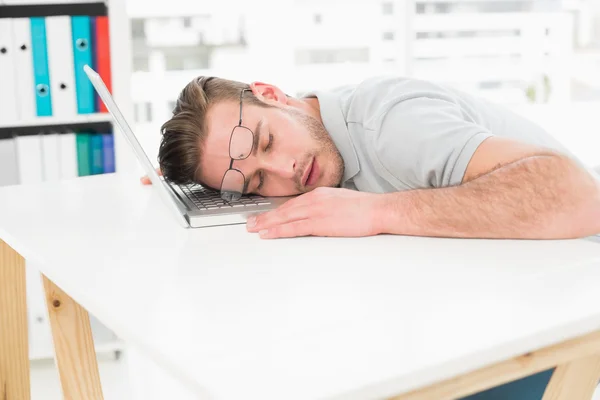 Tired businessman resting on laptop - Stock Image - Everypixel