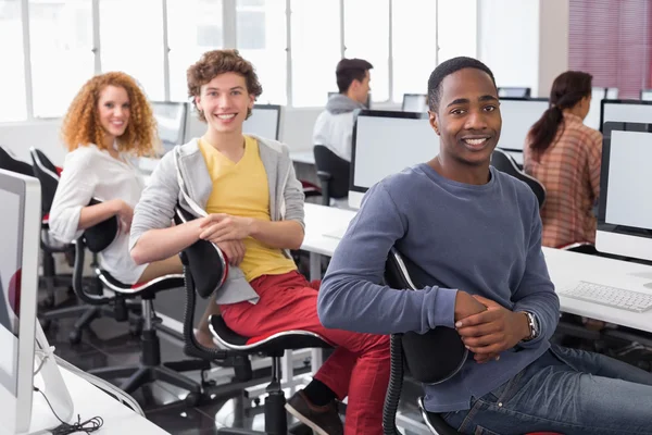 Students working in computer room - Stock Image - Everypixel
