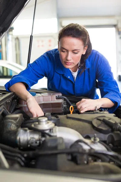 Mechanic working under the hood - Stock Image - Everypixel