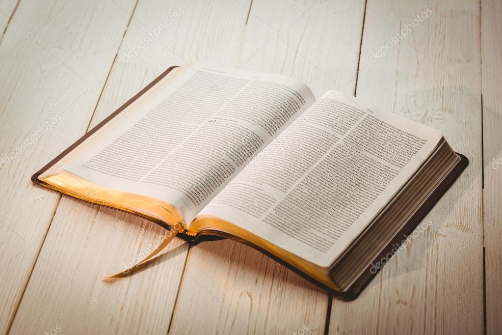 Open bible on table — Stock Photo © Wavebreakmedia #68954169 Open bible on table — Stock Photo © Wavebreakmedia #68954169